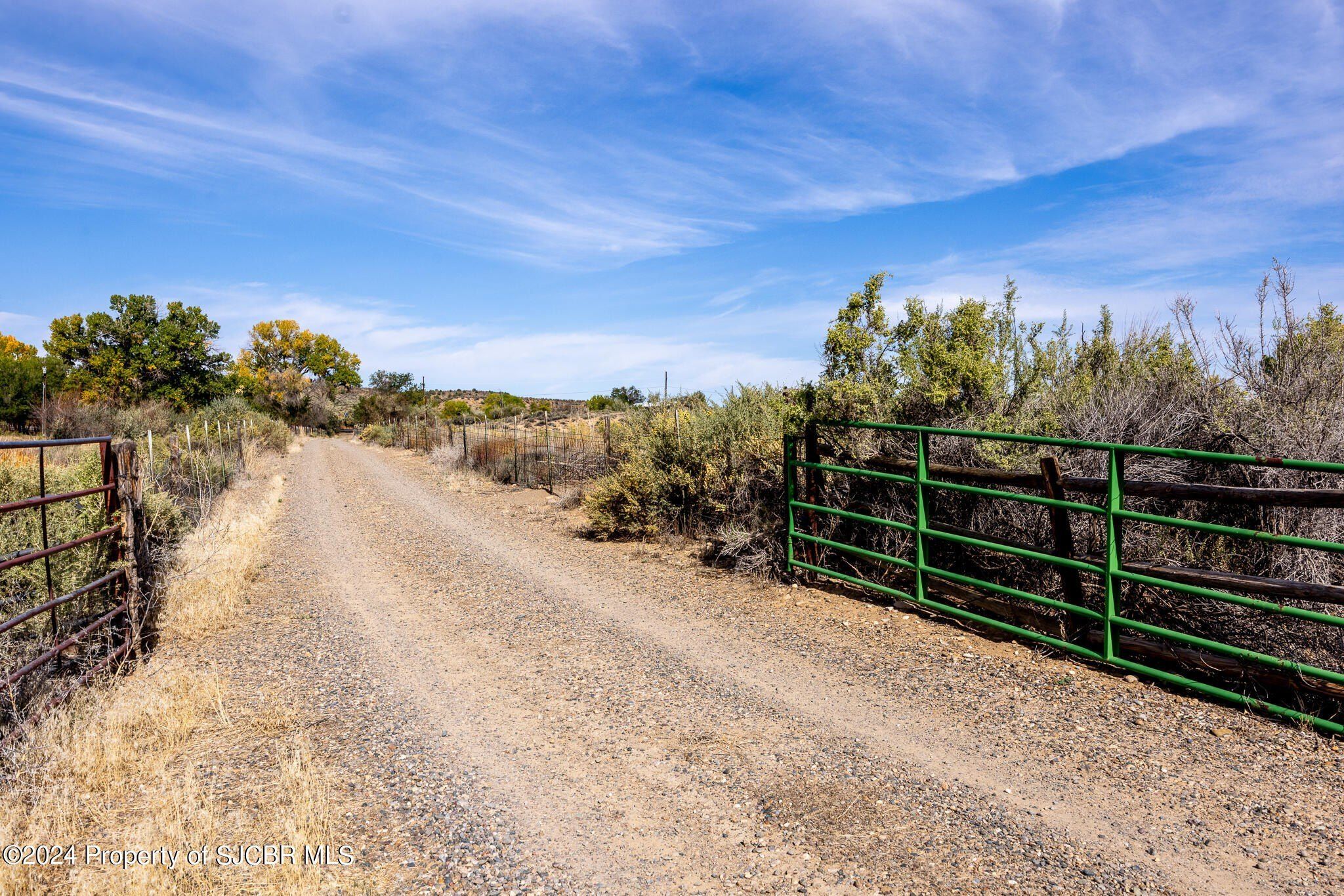 976 NM 170, Farmington, NM 87401 | MLS: 25-404 | Land and Farm